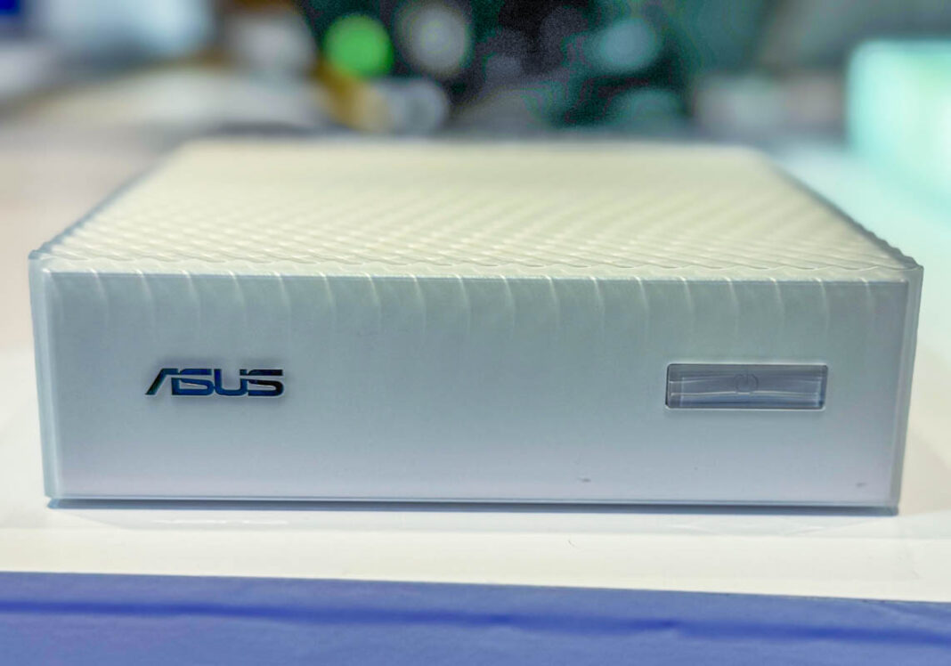 This is the ASUS Ascent GX10 a NVIDIA GB10 Mini PC with 128GB of Memory ...